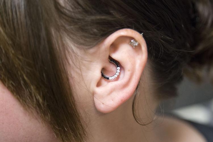 Are piercings and tattoos still considered unprofessional in modern day ...