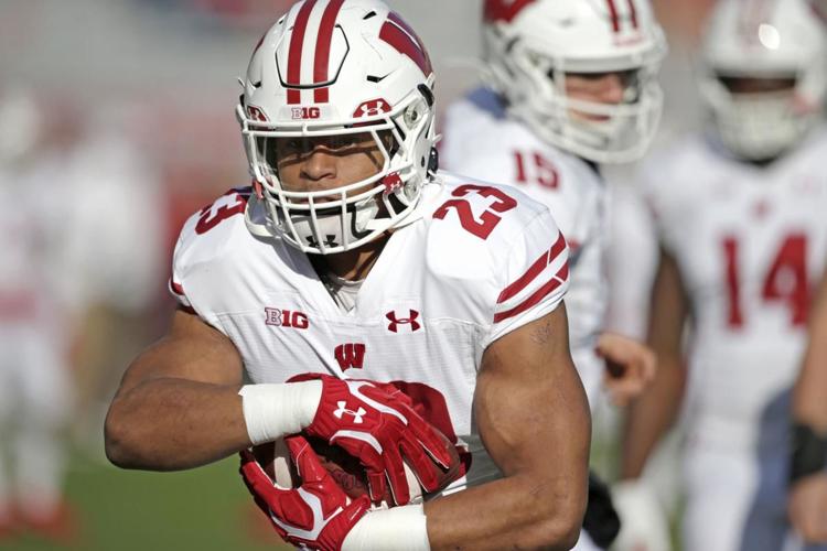 Big Ten weekly football roundup | Ohio State rolls Michigan, Wisconsin ...