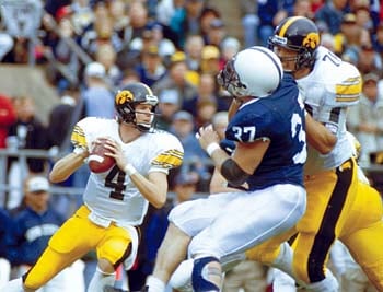 Iowa's humble QB McCann leads teammates by example on the football ...