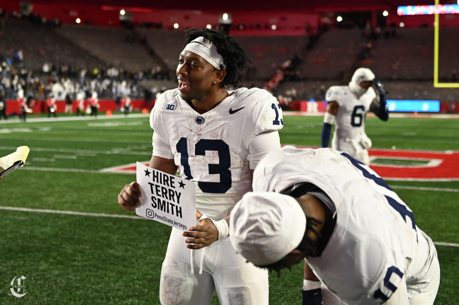 PSU Football vs. Rutgers 11/29, Allen Holds Hire Sign | | psucollegian.com