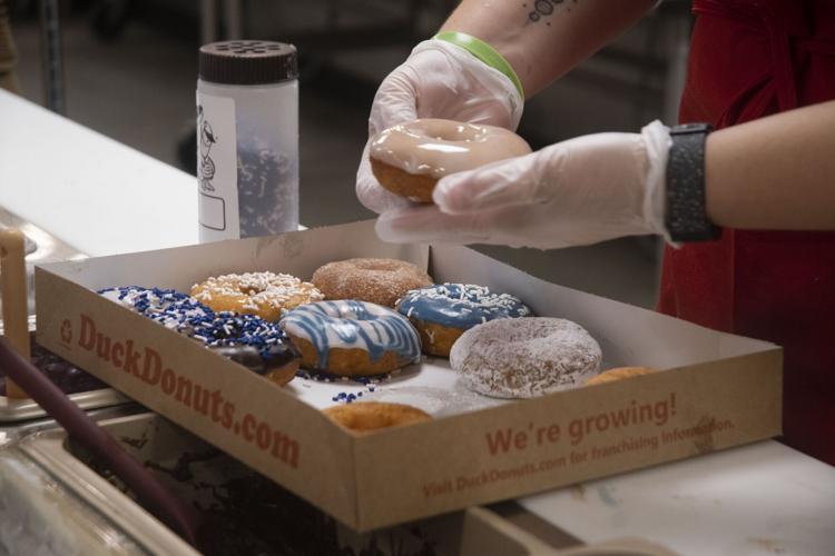 State College's Duck Donuts location reopens with ribbon-cutting ...