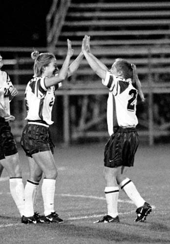 Kelly Convey celebrates a goal with Carole Dutchka | Archived News ...