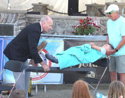 Magician Richard Benninghoff entertaining crowds at Festival in the ...