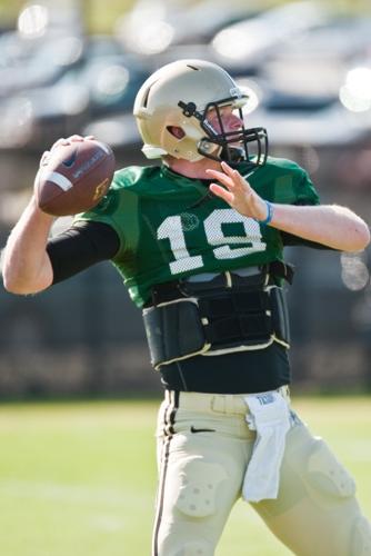 Lead quarterback vies for field time while supporting his teammates ...
