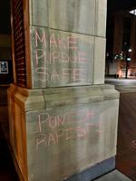 Purdue's Arch covered in chalk writing calling for resignation of Katie ...