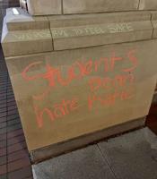 Purdue's Arch covered in chalk writing calling for resignation of Katie ...