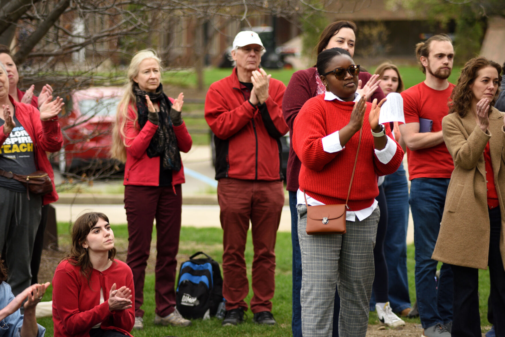 Professors, students protest Trump's policies in the rain | Campus ...