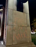 Purdue's Arch covered in chalk writing calling for resignation of Katie ...