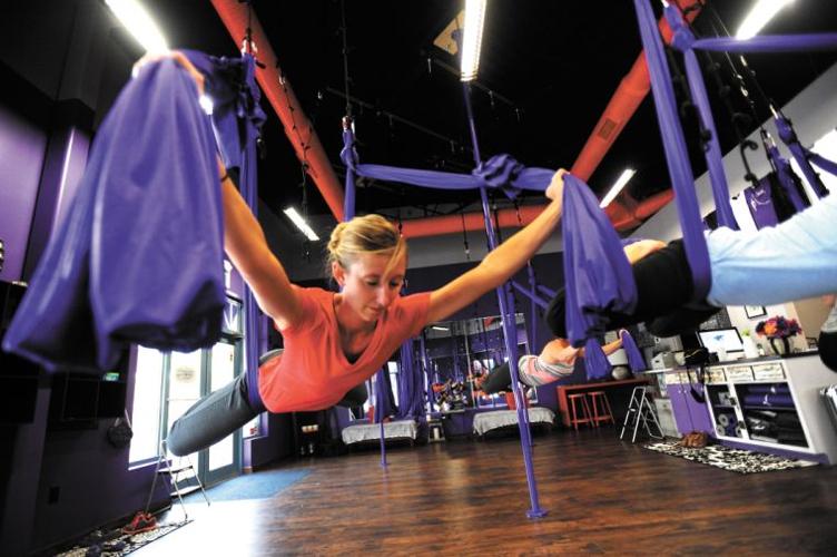 An inside look at aerial yoga at Studio Soar | Features ...