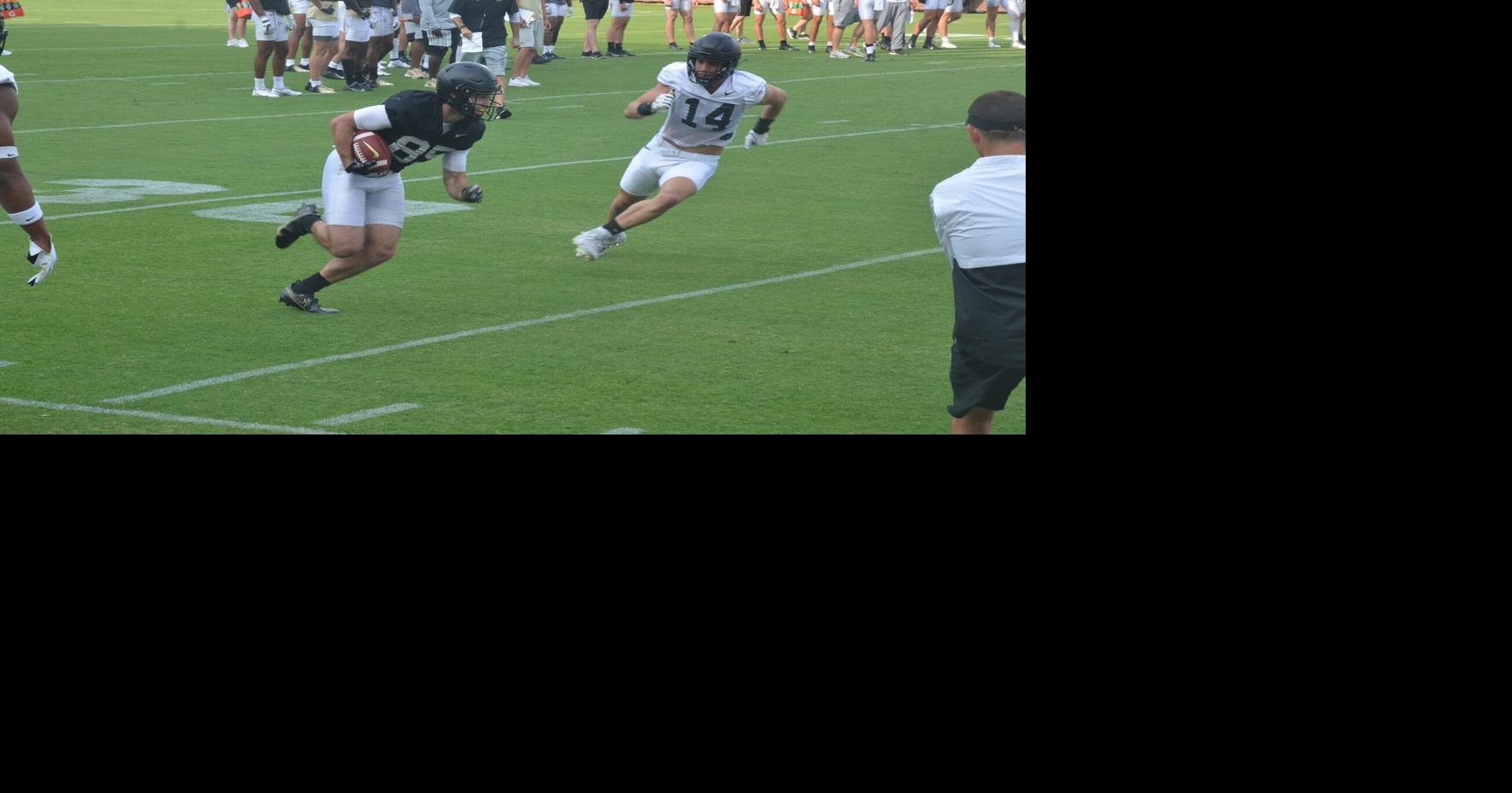 Bright lights, big hits: A look at Purdue's first summer practice ...