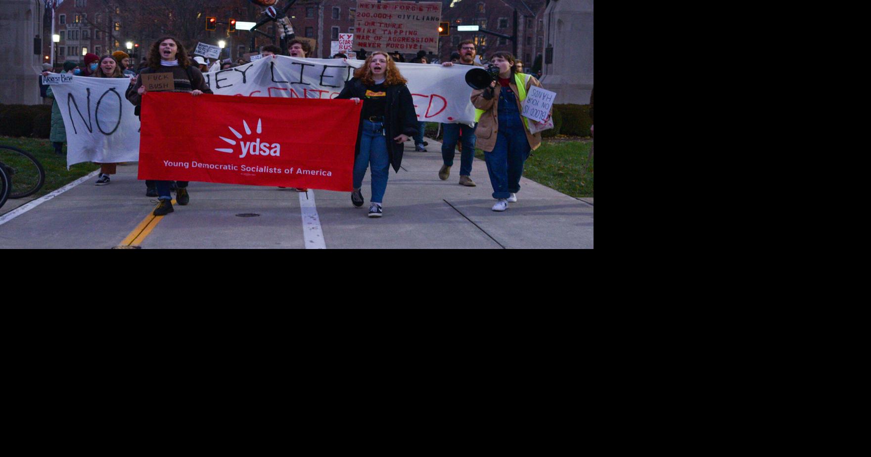 Protesters gather in opposition to protest George Bush talk on campus ...