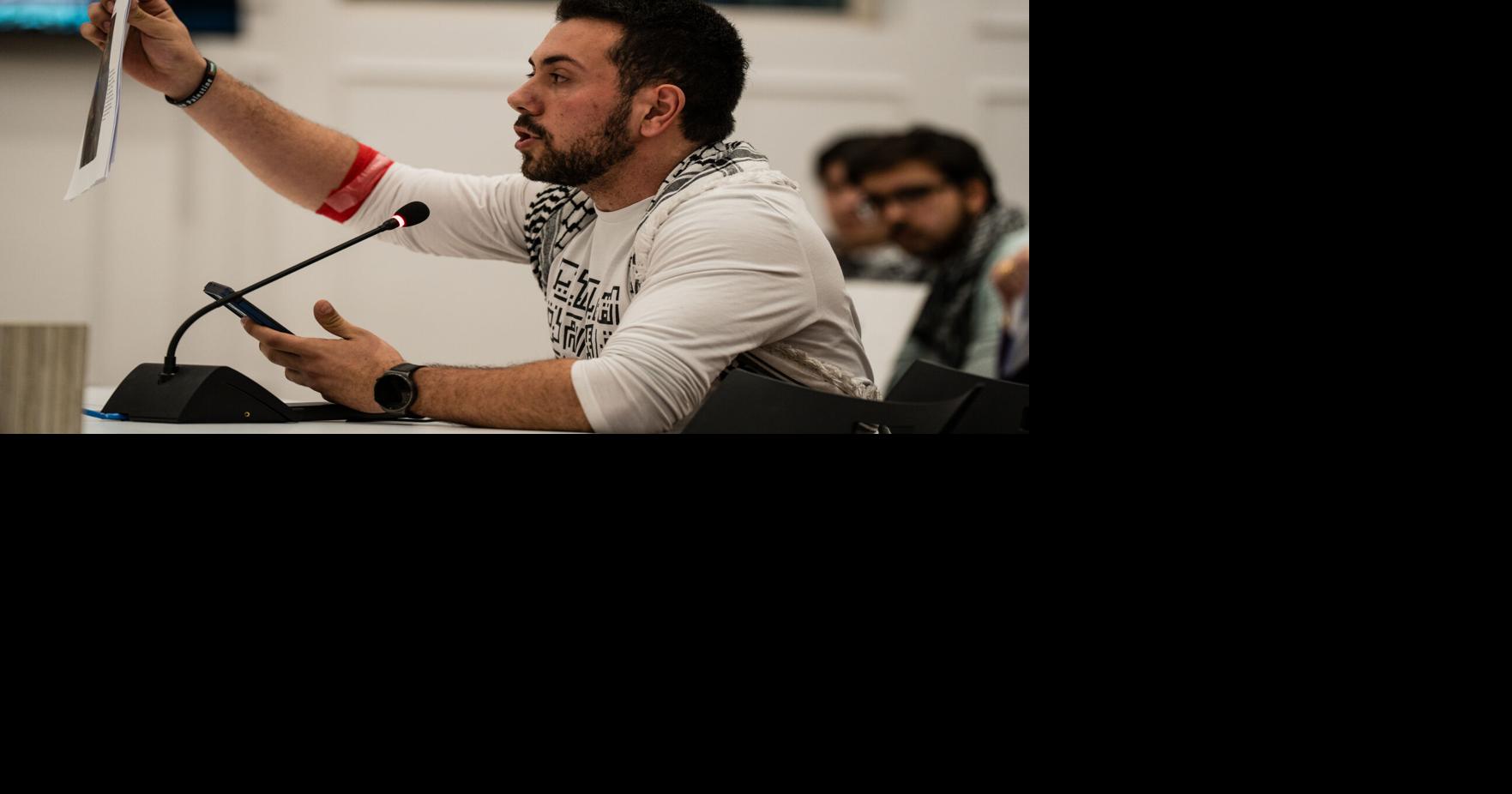 Johnny Hazboun shows an exhibit to the council | Campus ...