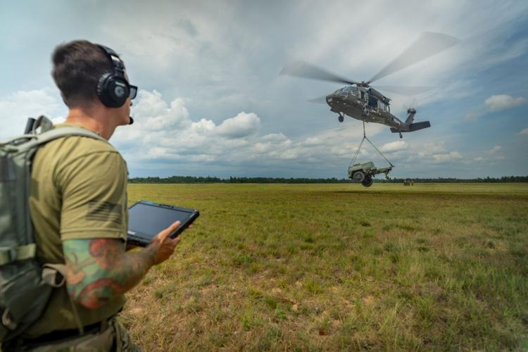 Guardsman flies remote-control Black Hawk chopper using tablet ...