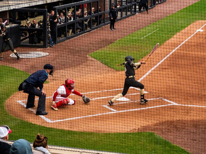 Moore continues family legacy, named rookie record breaker | Campus ...