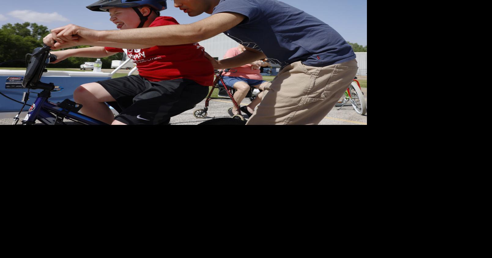 Photos: Children's Therapy Center partners with iCan Shine to provide biking lessons