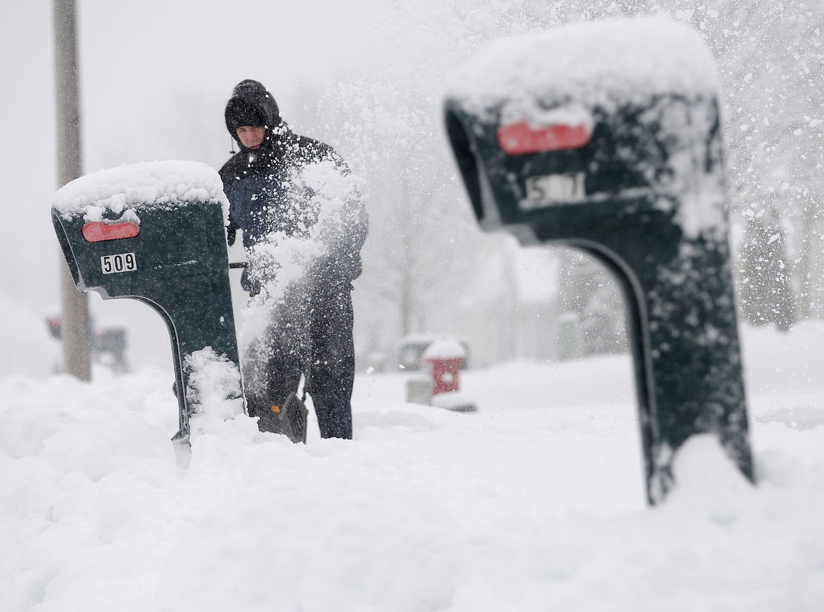 Heavy, wet snow blankets QC