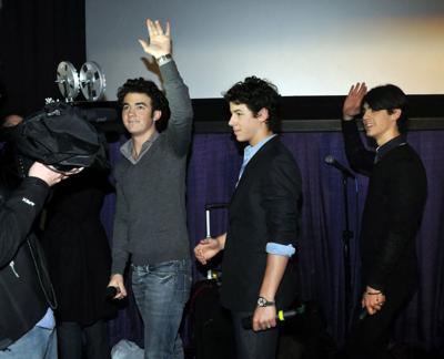 The Jonas Brothers play ball on tour