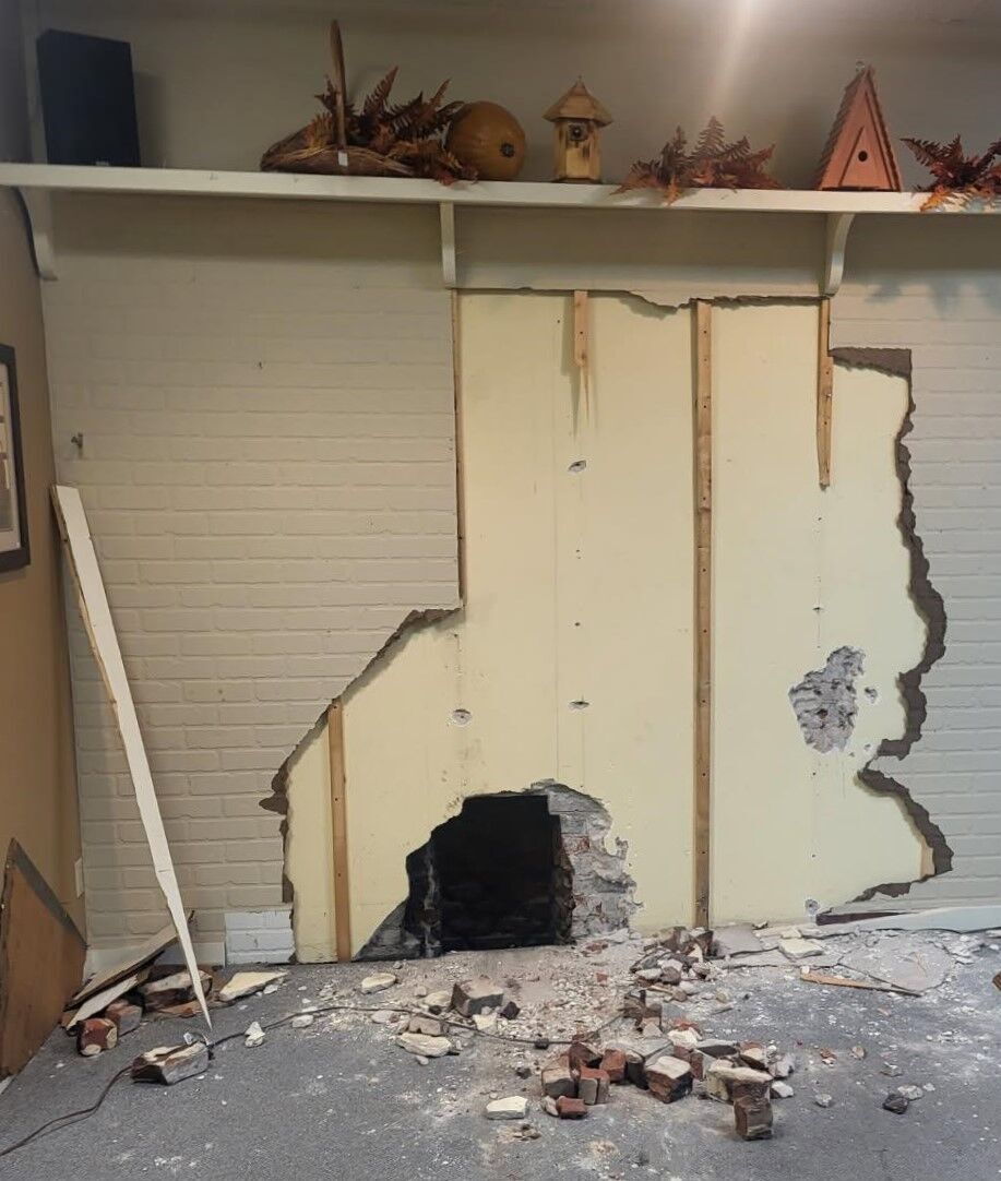 Geneseo shop owner: Woman stuck in wall could have died