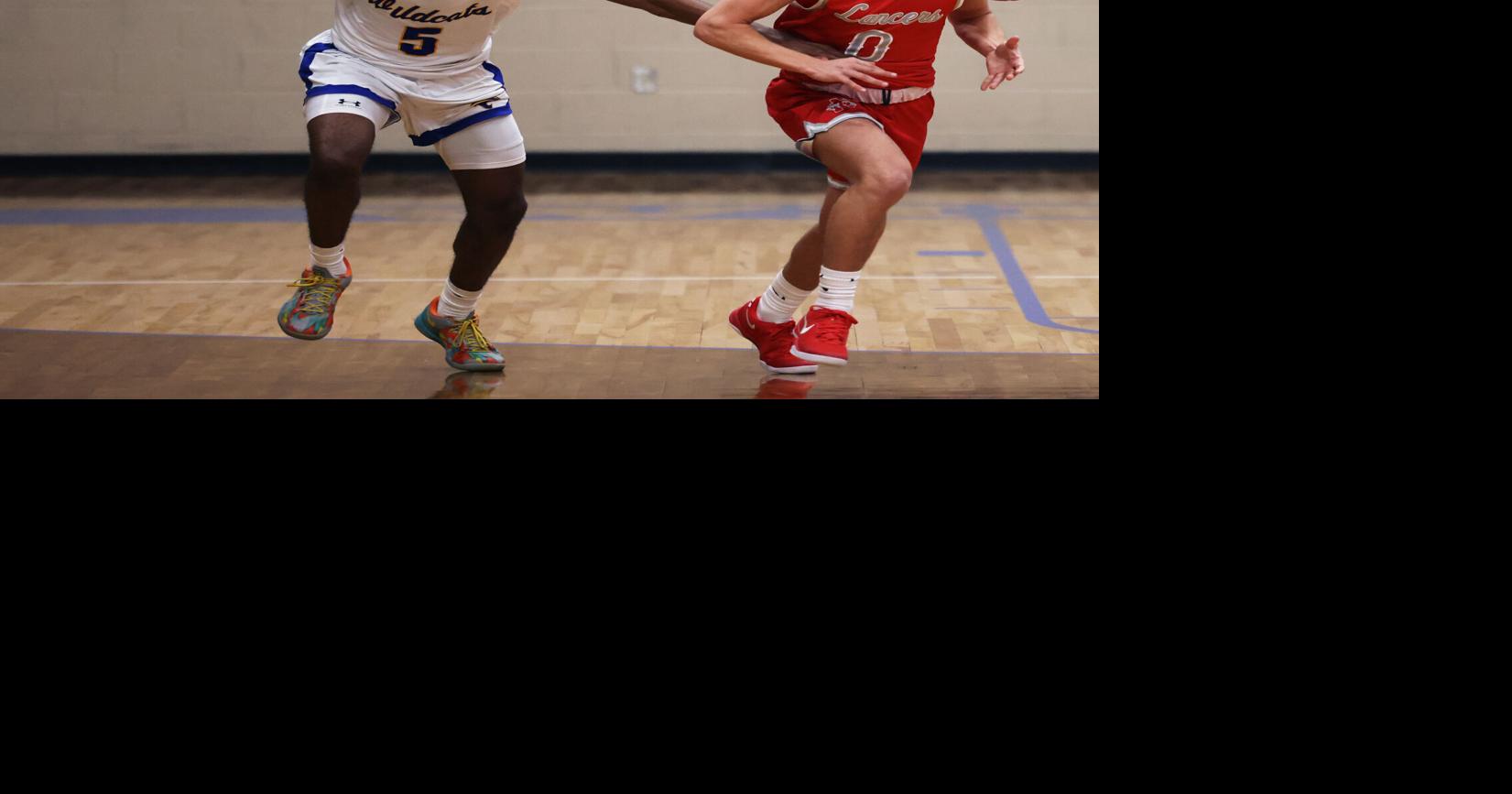 PREP BOYS BASKETBALL: Young Lancers hold off hosting Wildcats in MAC battle