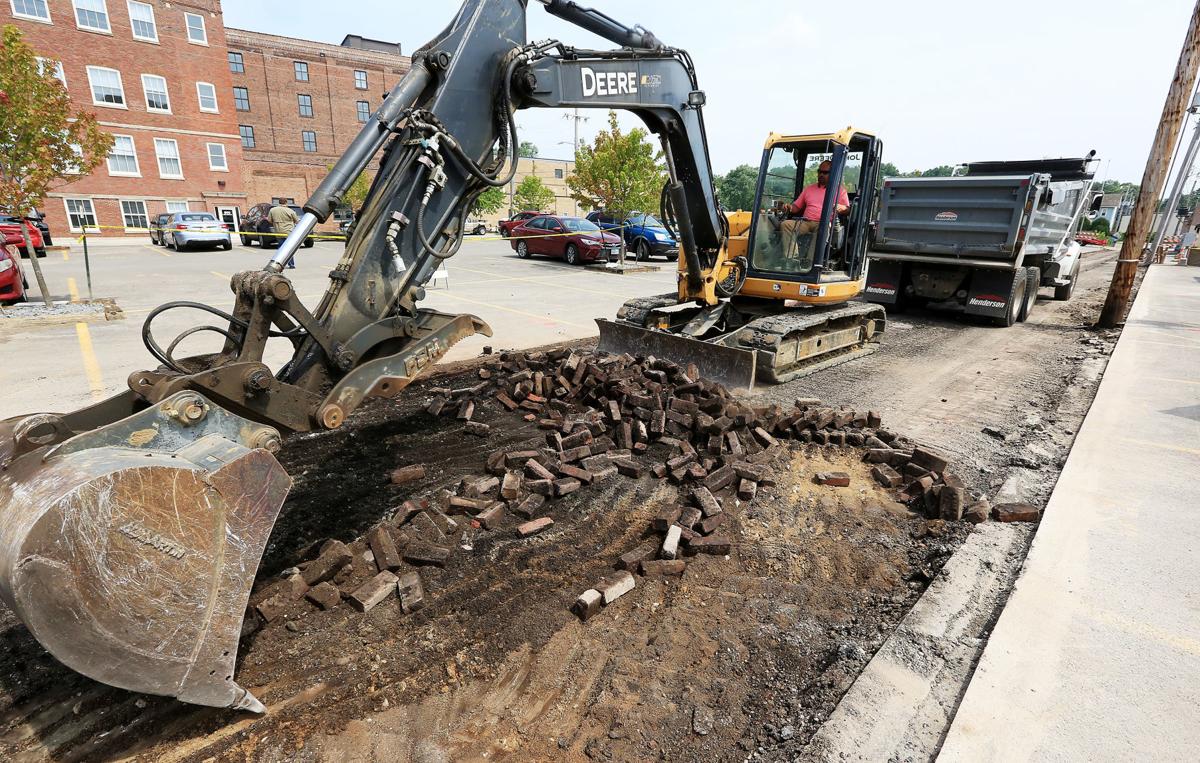 Davenport fire department will hose down alley to show how permeable ...