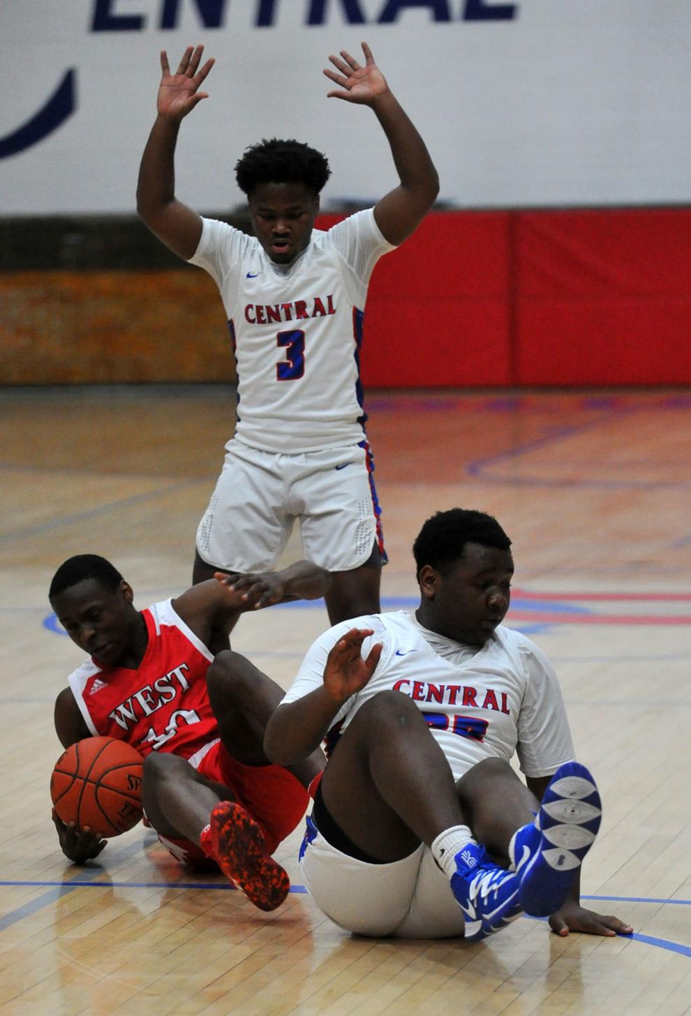 Photos: Davenport West vs Davenport Central boys basketball