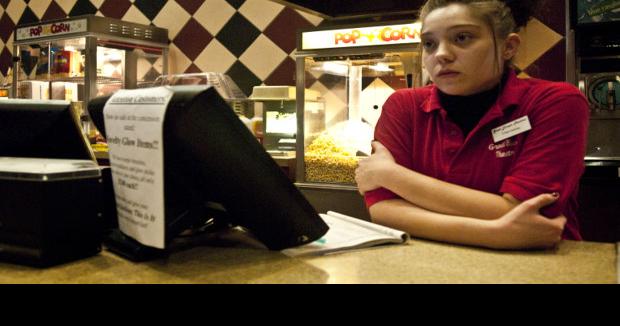 Concession worker knows when it's time to make the popcorn