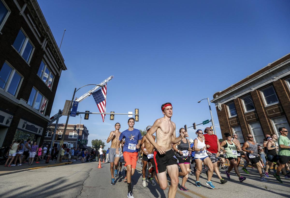 Flag exchange has been added to this year's Freedom Run in East Moline ...