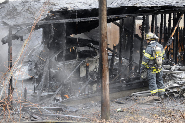 Rock Island fire damages vehicles