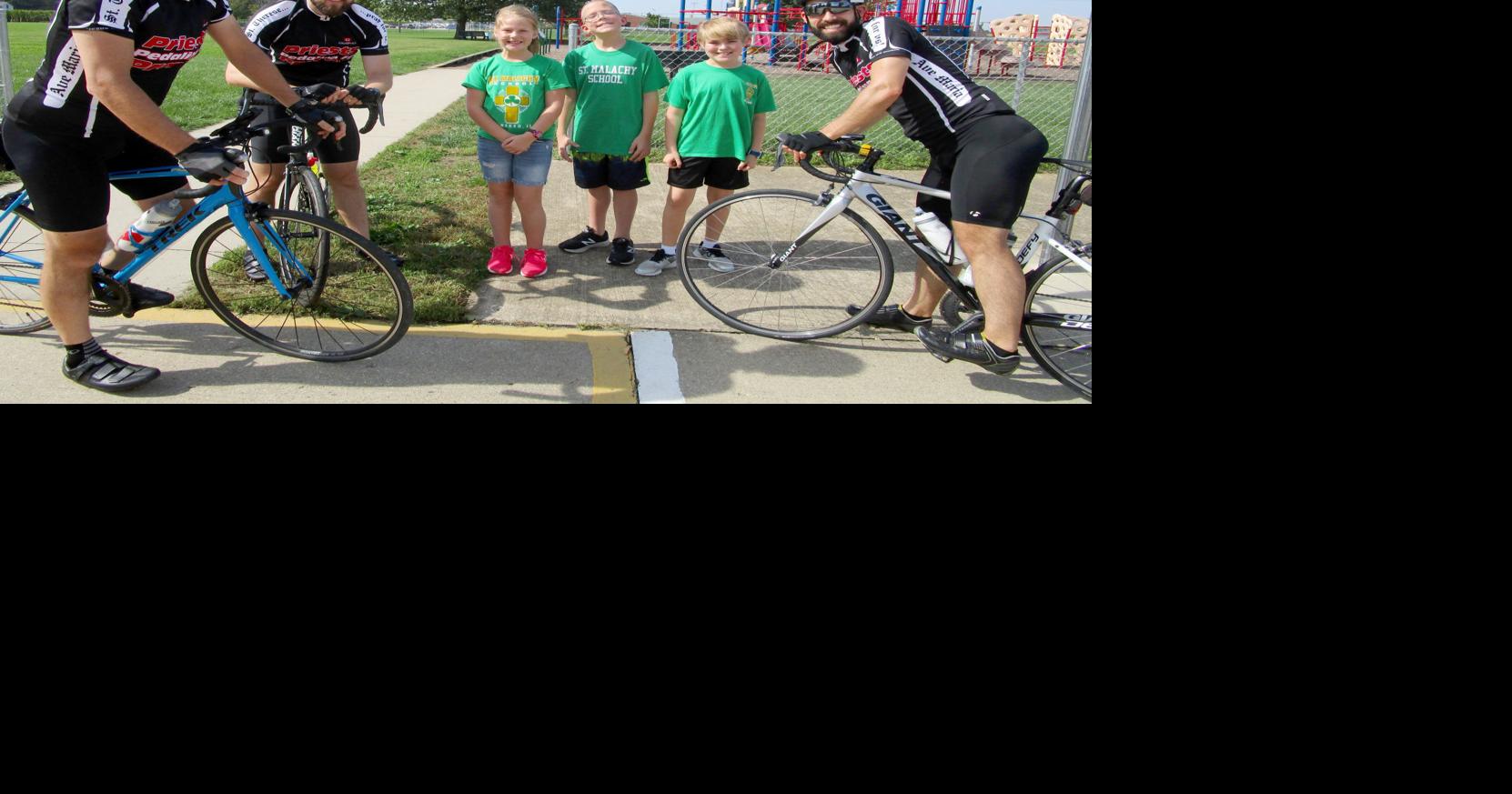 Trio of priests bike across Diocese of Peoria to inspire others to ...