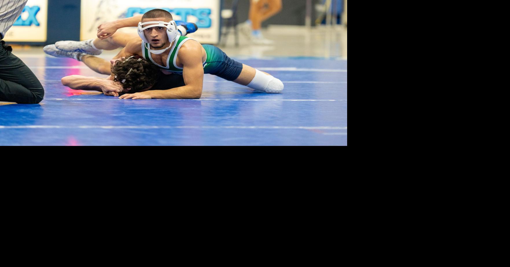 A Dive into Wrestling Season | Sports | quovadisnewspaper.com