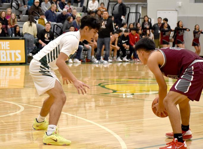 Boys hoops squad finds its offensive groove, notches two victories at ...
