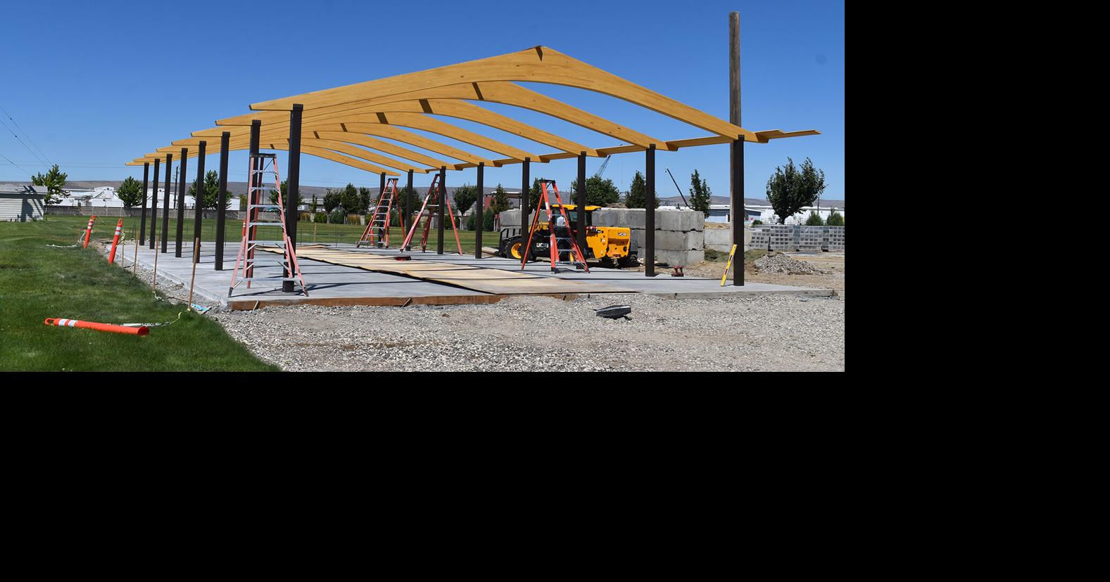Cemetery pavilion rises as construction continues in heat of summer ...