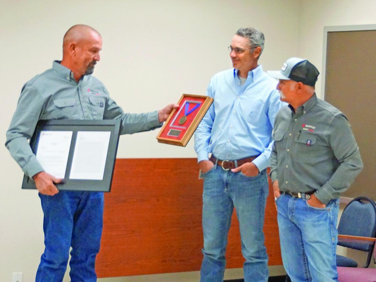 Line worker honored by Xcel Energy for actions during Roswell flood ...