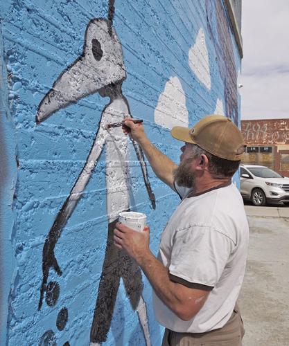Something 'Fish-y' coats wall at Dexter teen center | Local News ...