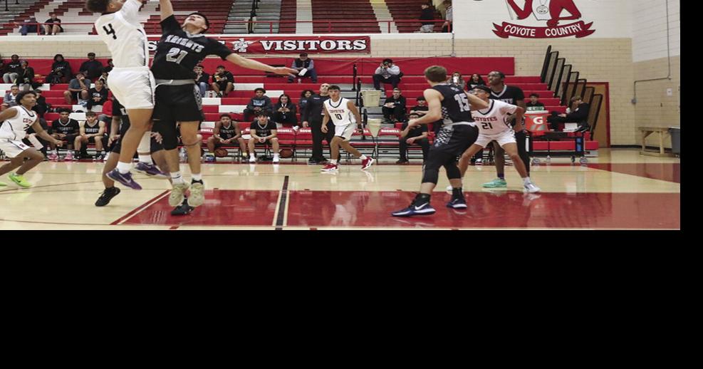 Roswell's Steve McCaskill takes a contested jumper | | rdrnews.com