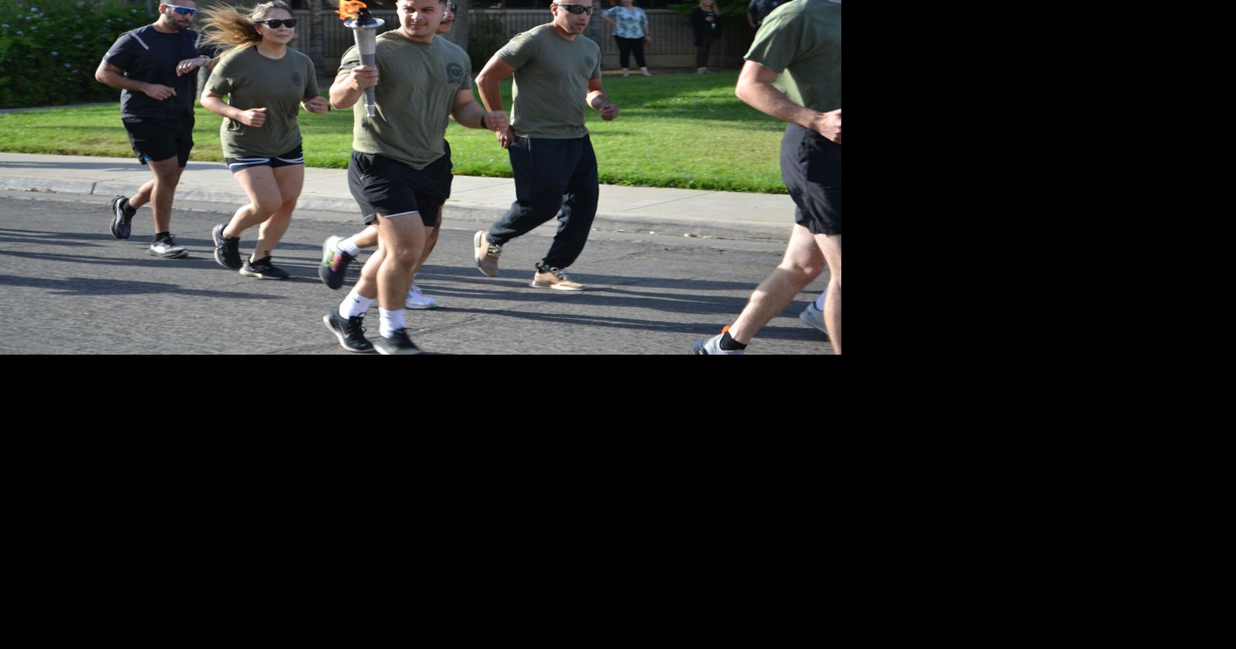 Passing The Torch: Law Enforcement Run held for Special Olympics ...