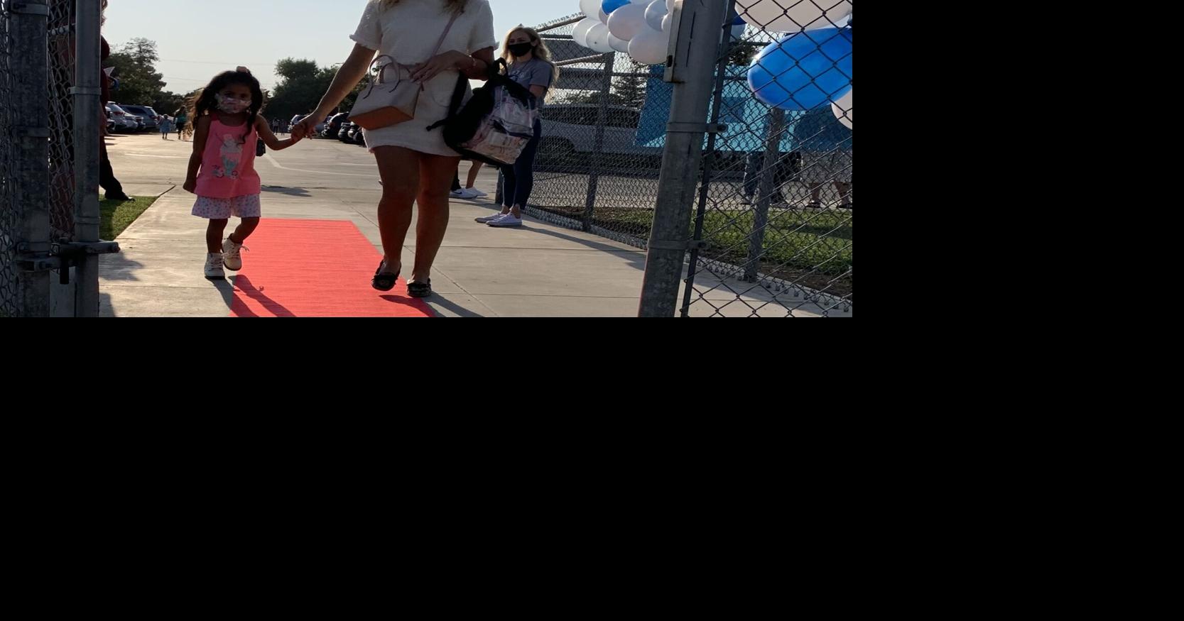 Can't Cover Their Joy: Burton children return to school | Photos ...