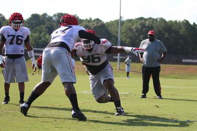 Practice Report: John Atkins back from injury, quarterbacks still ...