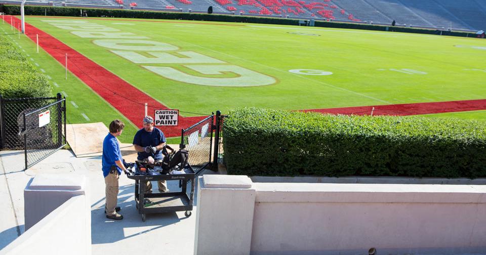 PHOTOS: UGA grounds crew prepares Sanford Stadium for Georgia football ...