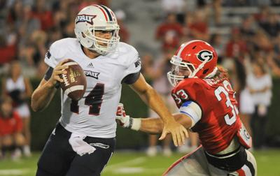 Football Notebook: Chase Vasser shows off ability, long locks in season ...