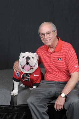 UGAAA Courtesy Claude Felton poses with Uga X | | redandblack.com