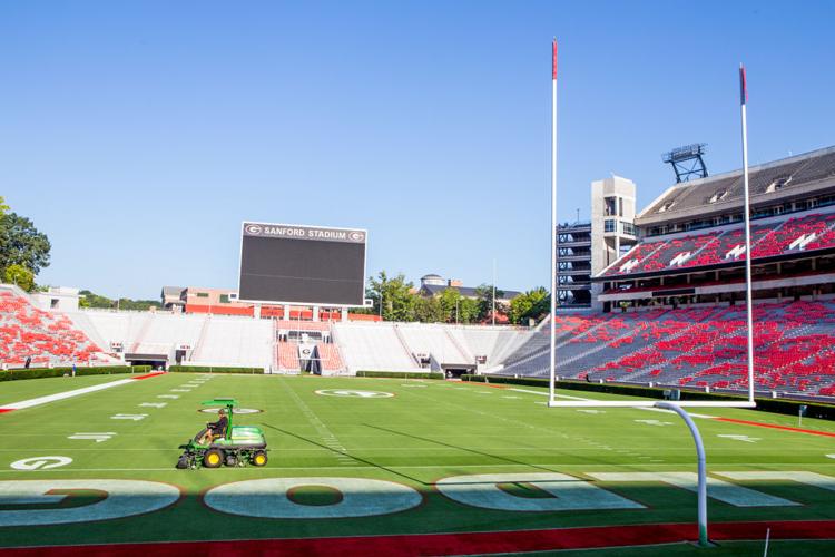 PHOTOS: UGA grounds crew prepares Sanford Stadium for Georgia football ...