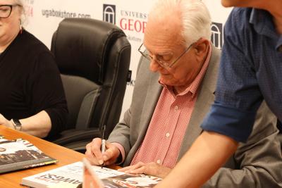 Georgia football historian Loran Smith holds author event and book ...