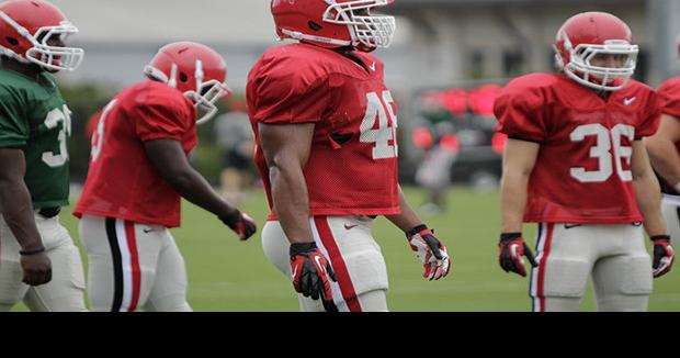 A new face mask and a new attitude for fullback Quayvon Hicks ...