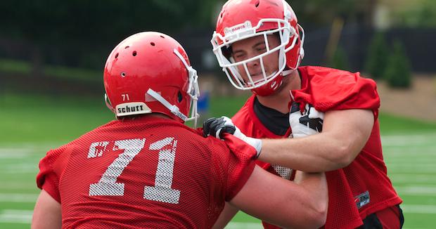 Football notebook: John Theus finally moving over to left tackle ...