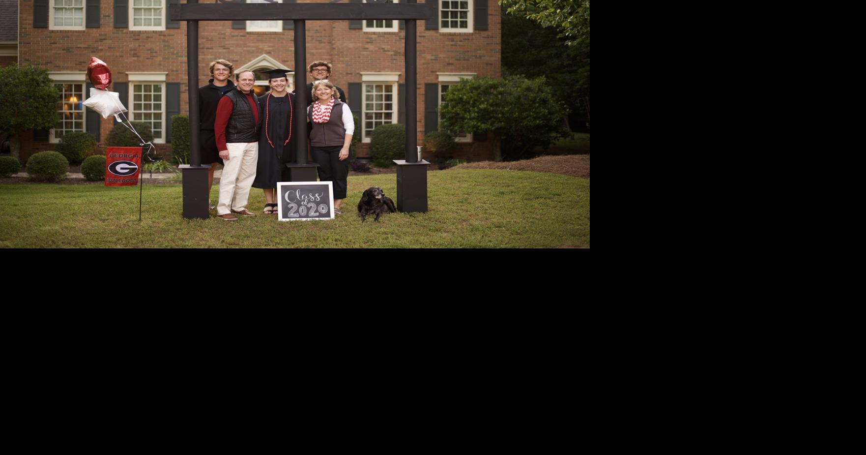 Home is where the Arch is: UGA graduate celebrates commencement with ...