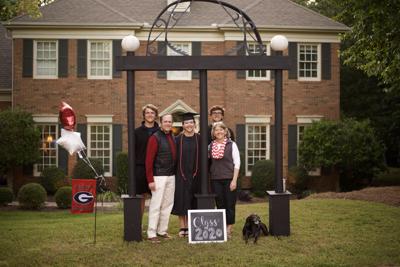 Home is where the Arch is: UGA graduate celebrates commencement with ...