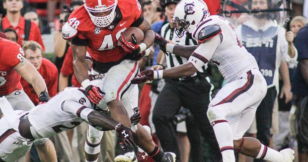 Fullbacks Quayvon Hicks and Merritt Hall in 'ongoing competition' for ...
