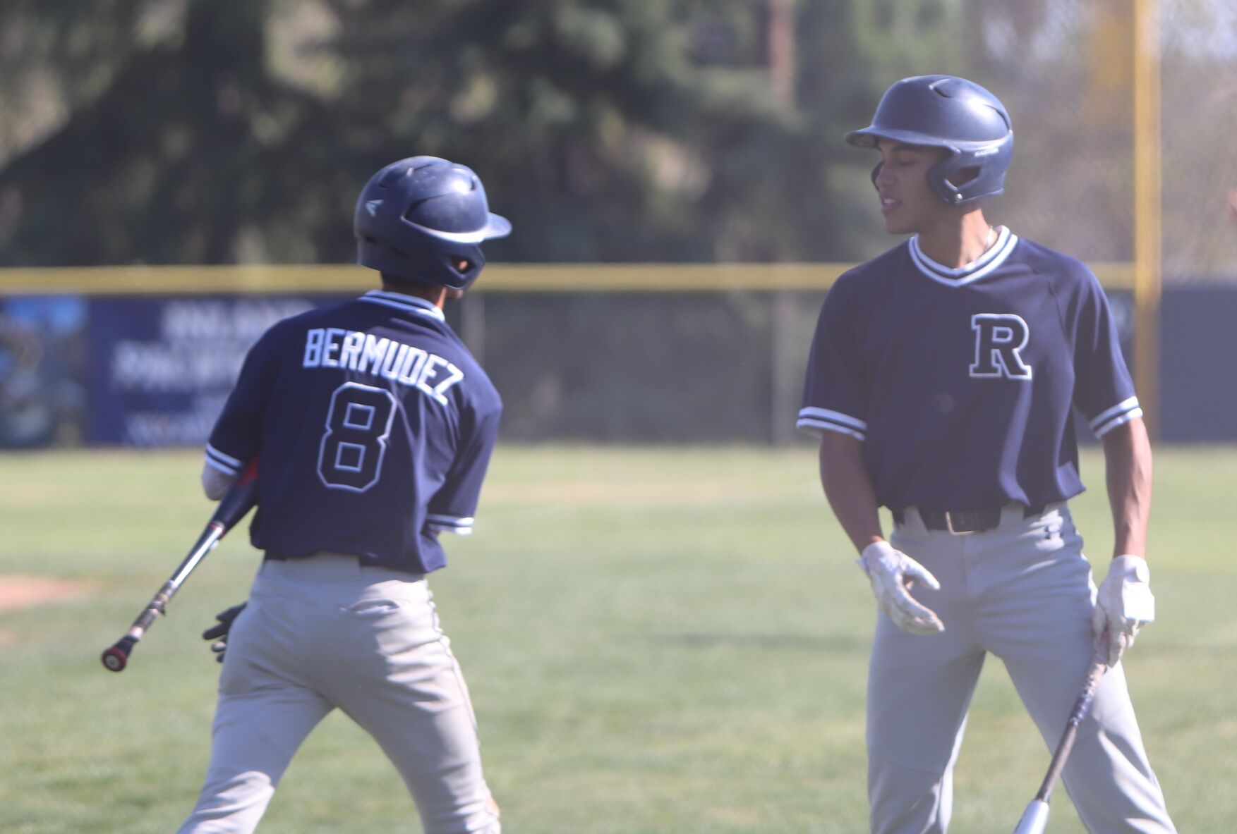 Redlands’ Jonathan Bermudez and a teammate celebrate a Terrier run ...