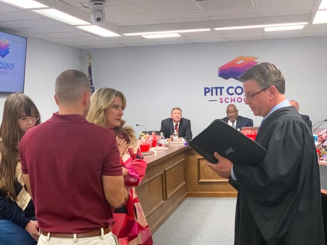 Rhodes elected school board chairman; two new members take oath of ...